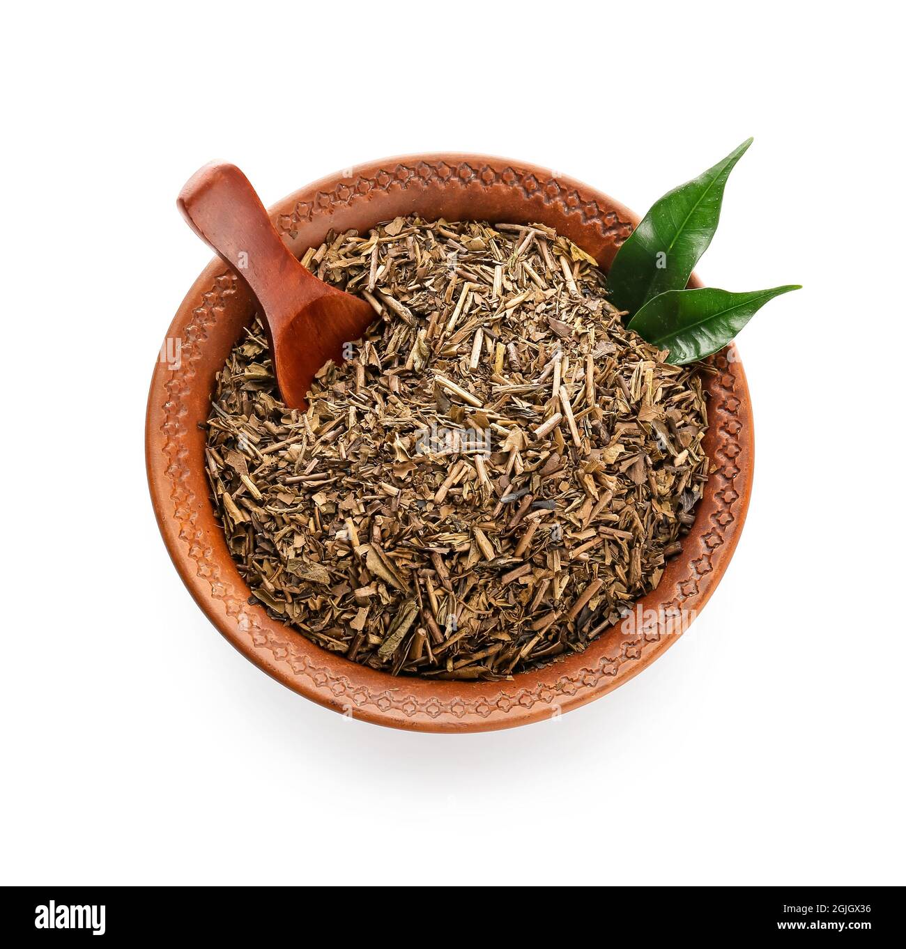 Bowl of dry hojicha green tea on white background Stock Photo - Alamy