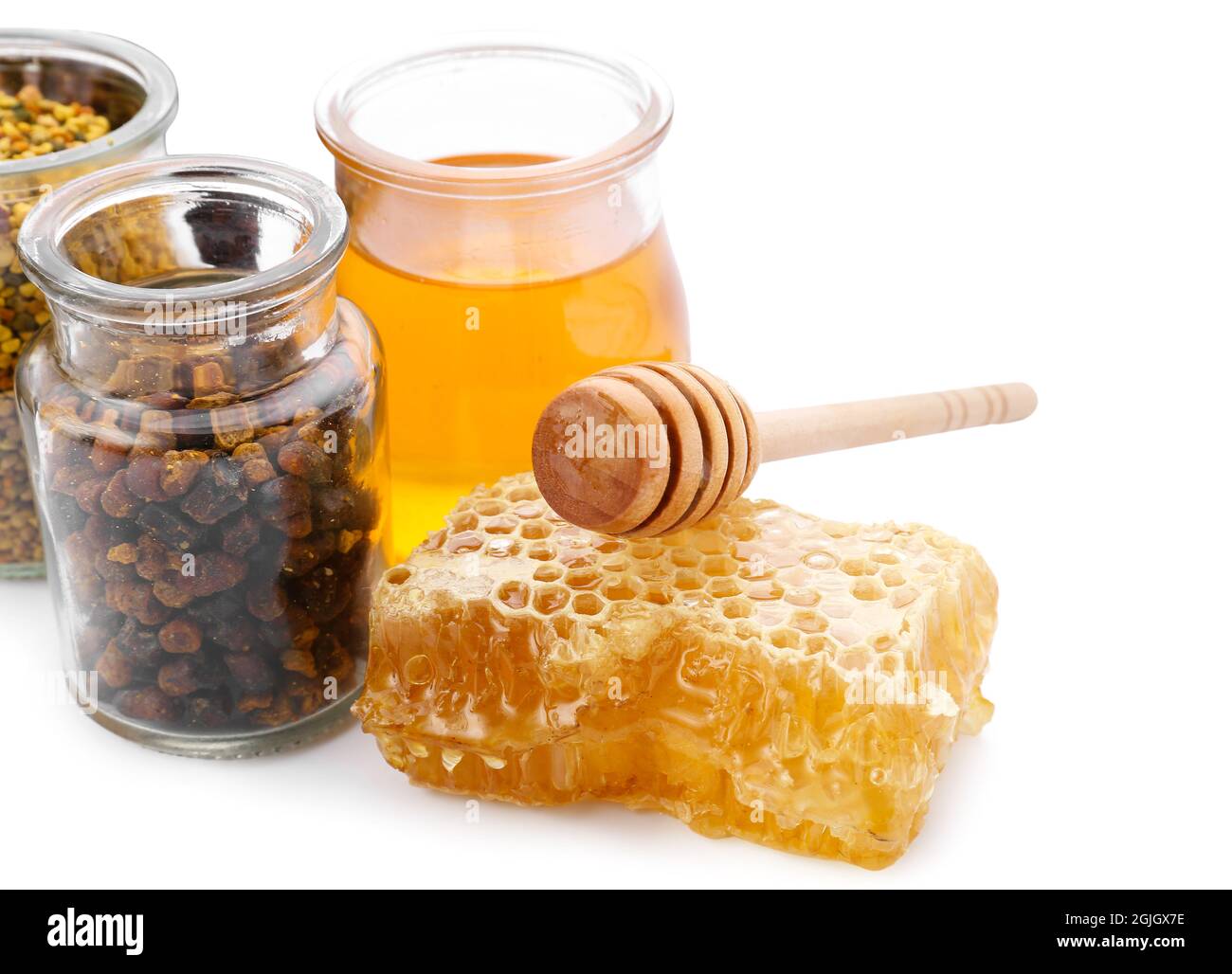 Different bee products on white background Stock Photo - Alamy