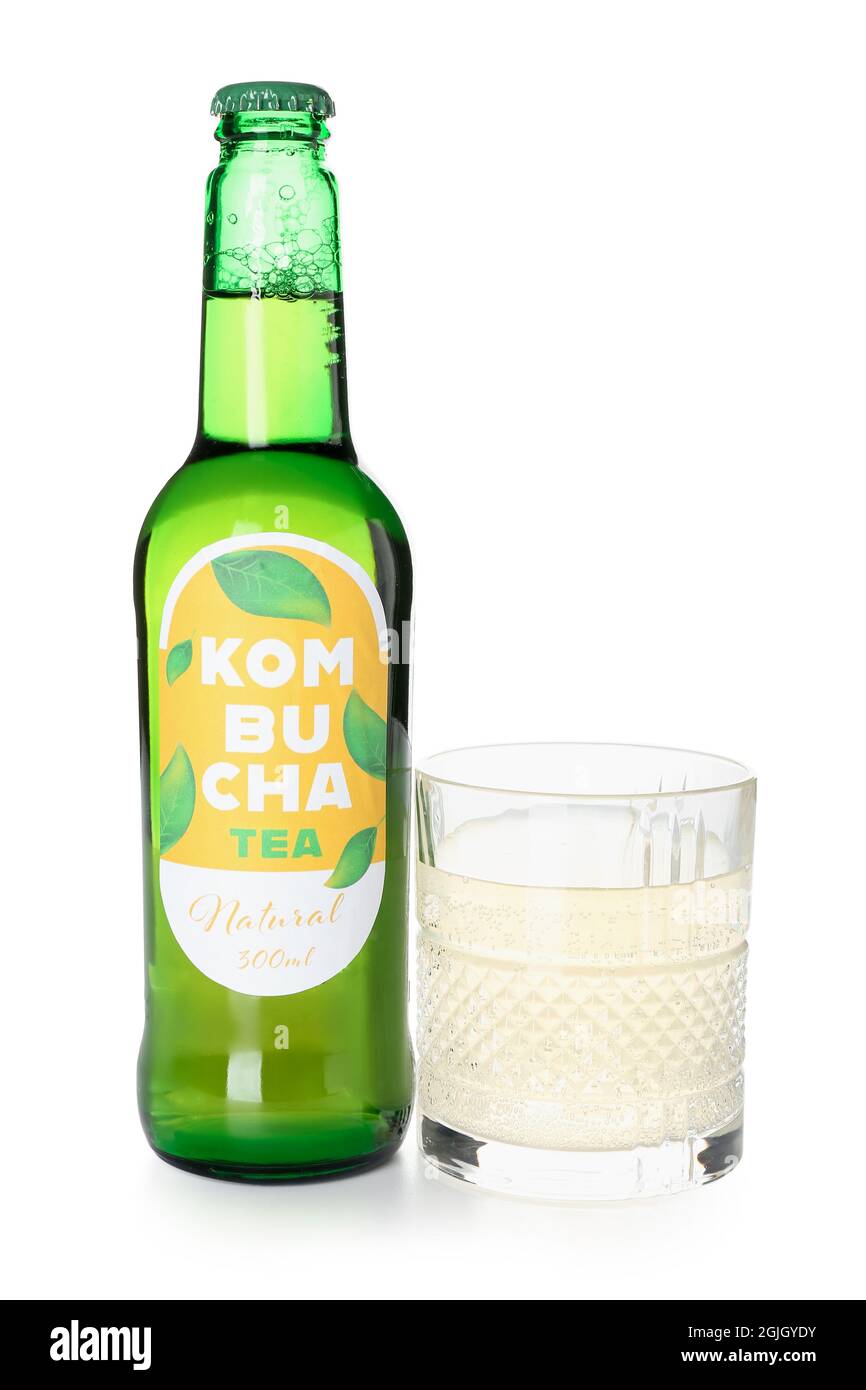 Glass and bottle of natural kombucha tea on white background Stock ...