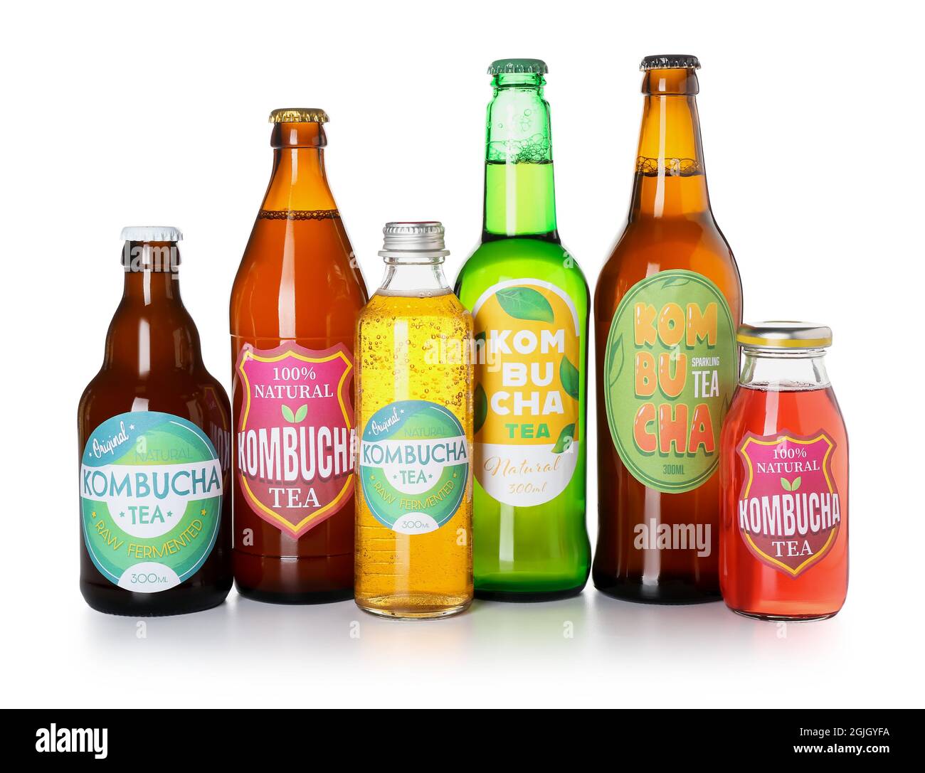 Different kombucha tea in bottles on white background Stock Photo - Alamy