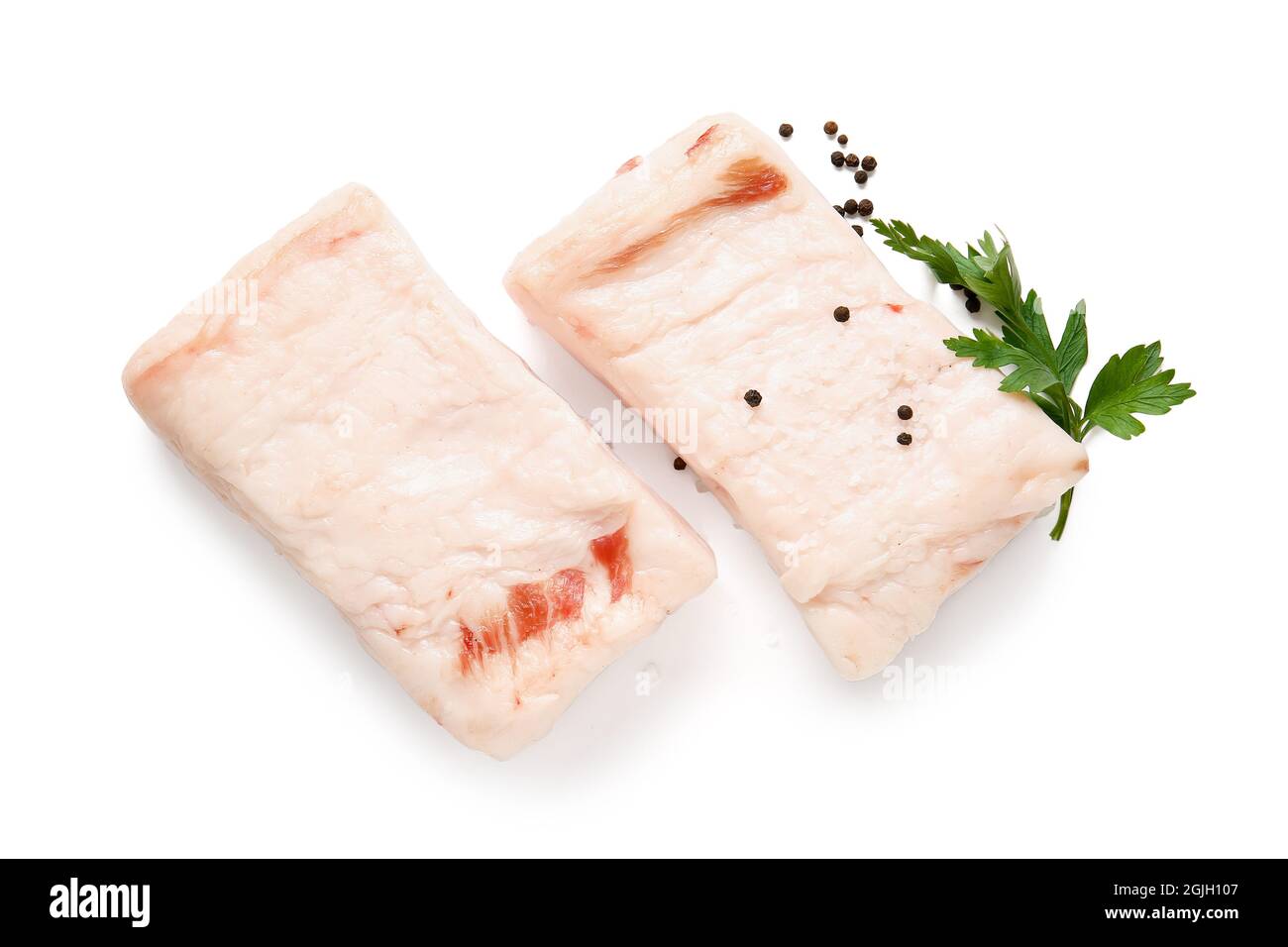 Raw lard with spices on white background Stock Photo - Alamy