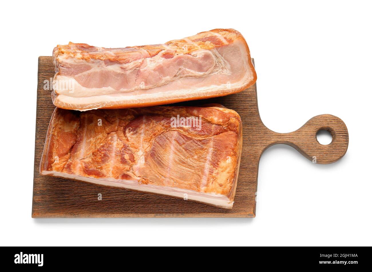 Wooden board with tasty smoked bacon on white background Stock Photo ...
