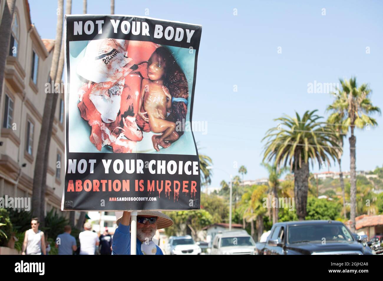San Clemente, California, USA. 24th Sep, 2020. : Man is holding a Anti ...