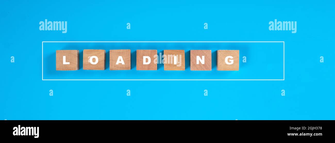 Square wood with LOADING letters in progress bar on a blue background ...