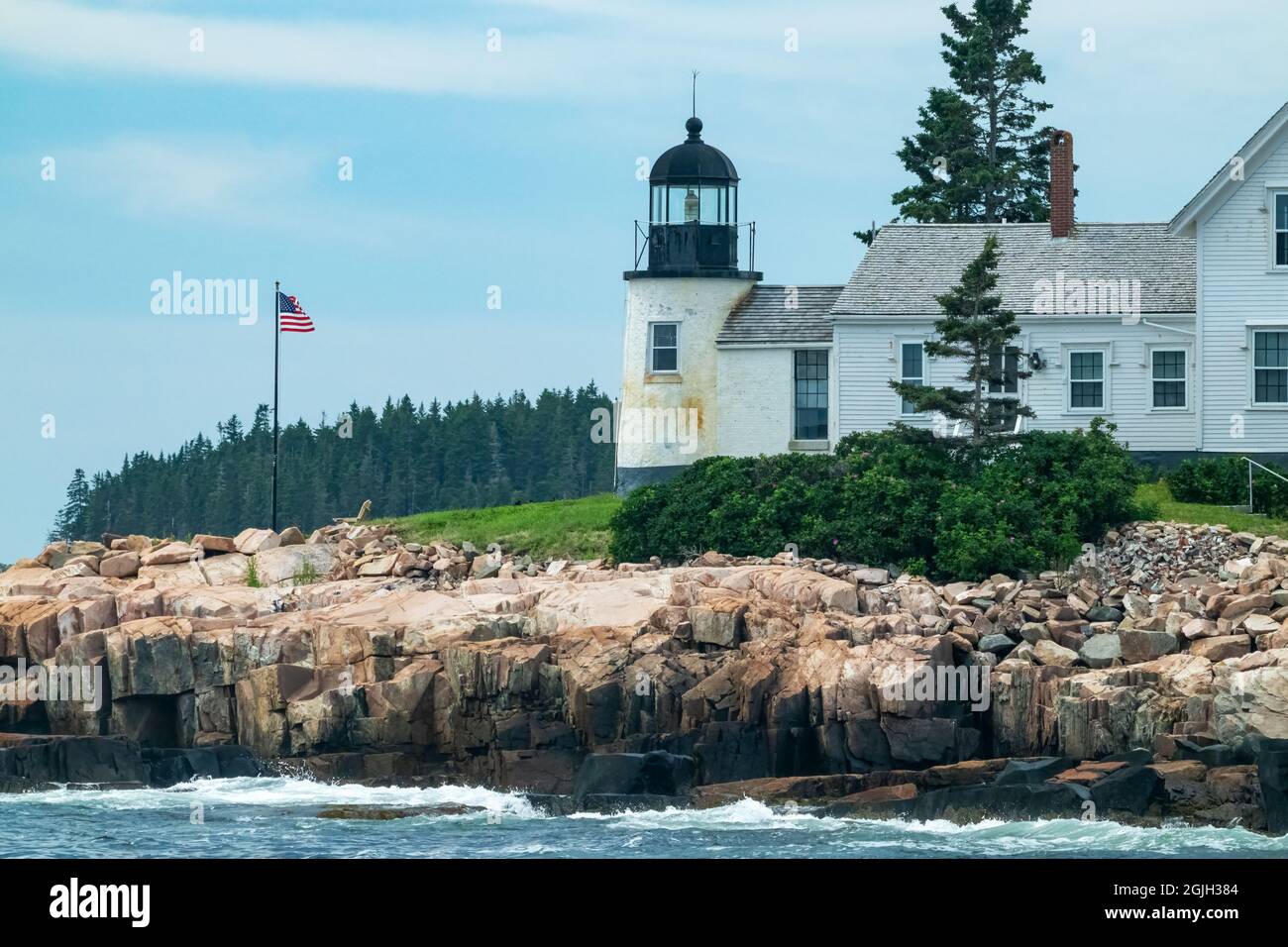 Gulf of Maine, USA. Winter Harbor lighthouse and National Wildlife ...
