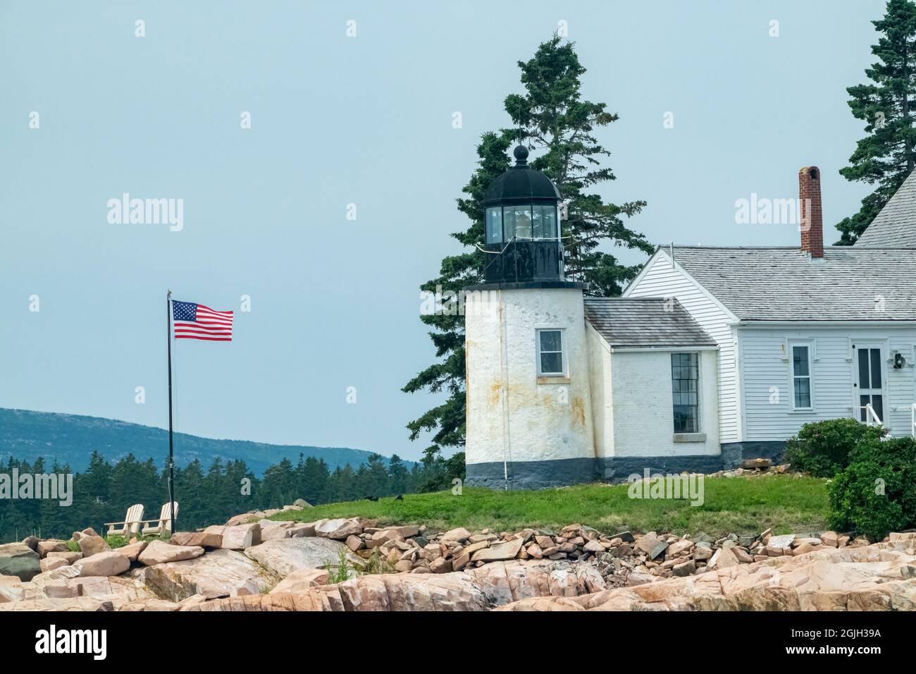 Gulf of Maine, USA. Winter Harbor lighthouse and National Wildlife ...
