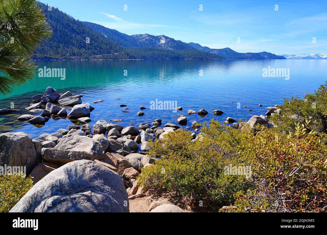 View of rocks and clear blue water in the Lake Tahoe Nevada State Park ...