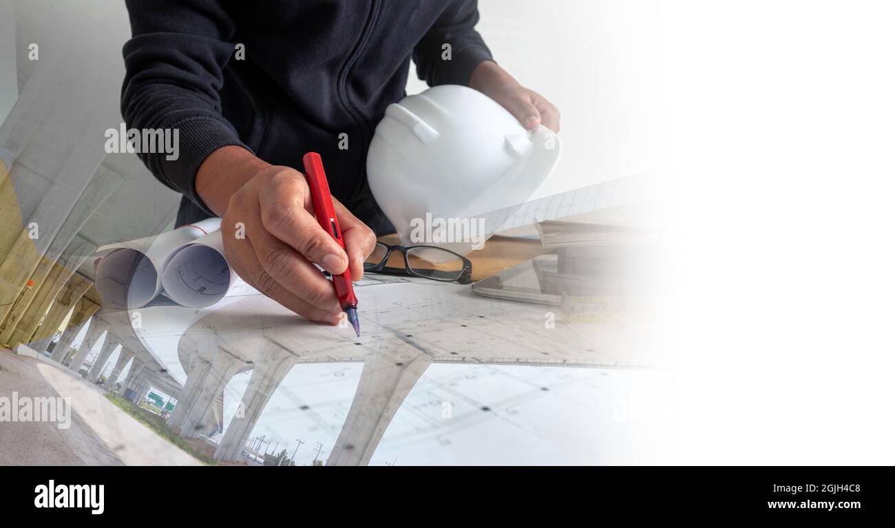 double exposure of architects design on desks and structures Stock ...