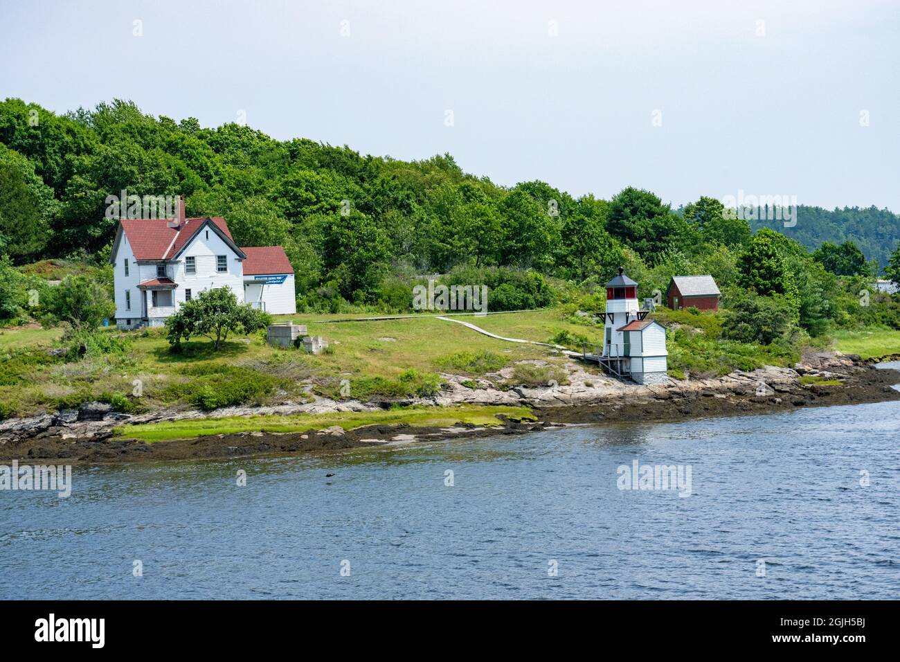 Located on Arrowsic Island in Maine, Squirrel Point Lighthouse is one ...
