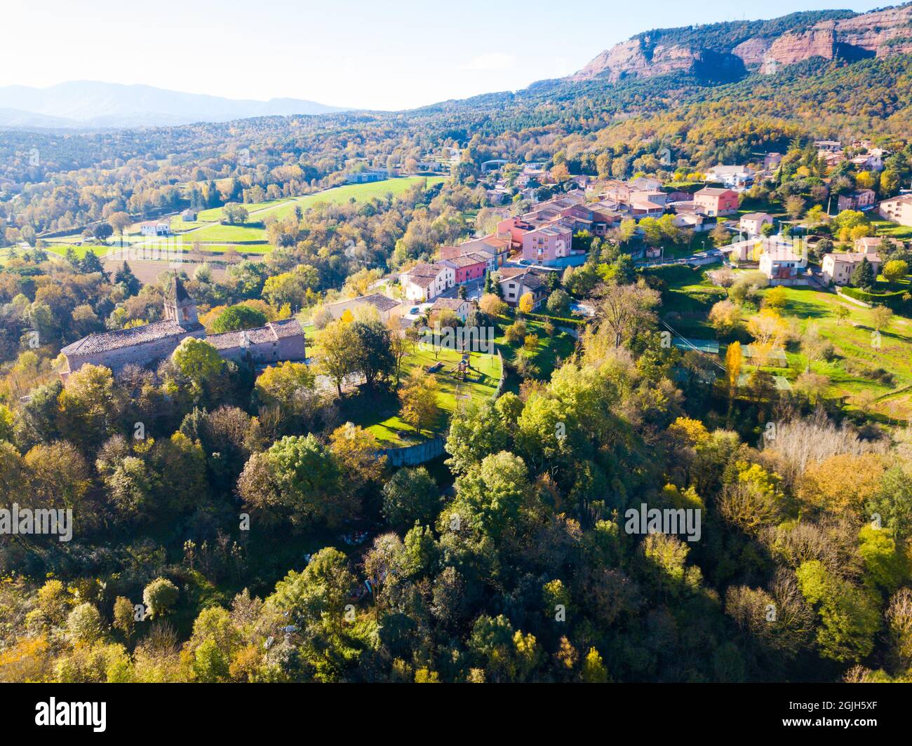Aerial view of houses and nature of Catalan village Vilanova de Sau ...