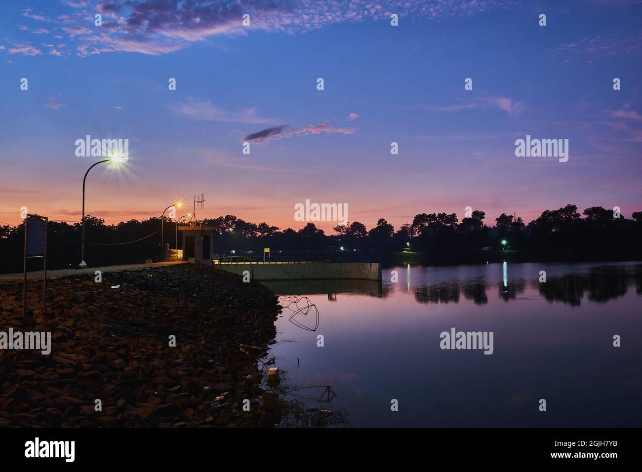 the atmosphere on the beach full of rocks Stock Photo - Alamy