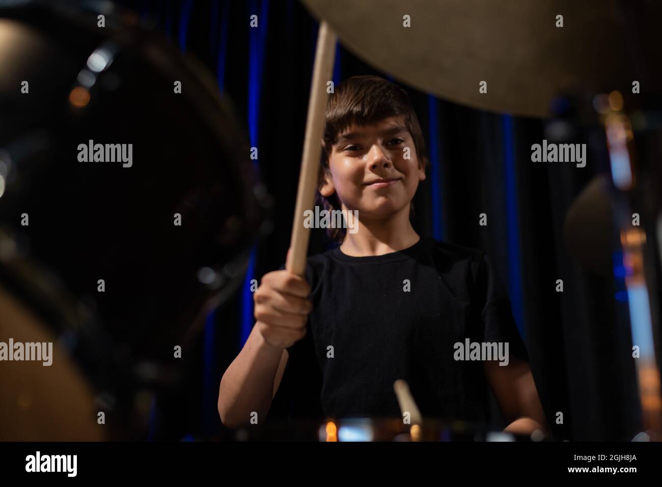 Children playing drums in school hi-res stock photography and images ...