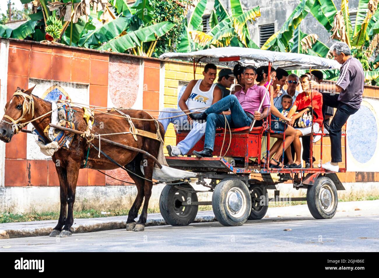 Horse drawn carriage and passengers, Sancti Spiritus, Cuba Stock Photo ...