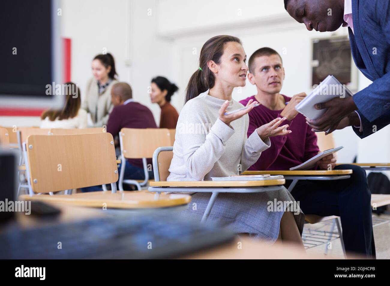 African american team leader holding meeting with diverse groupmates ...