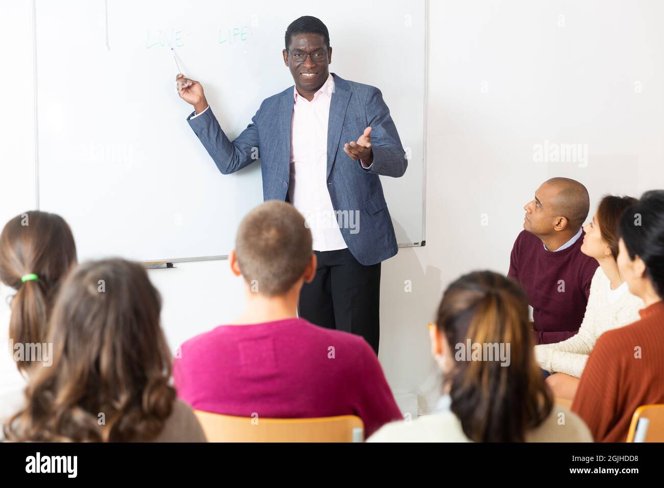 University teacher conducts lesson for students Stock Photo - Alamy