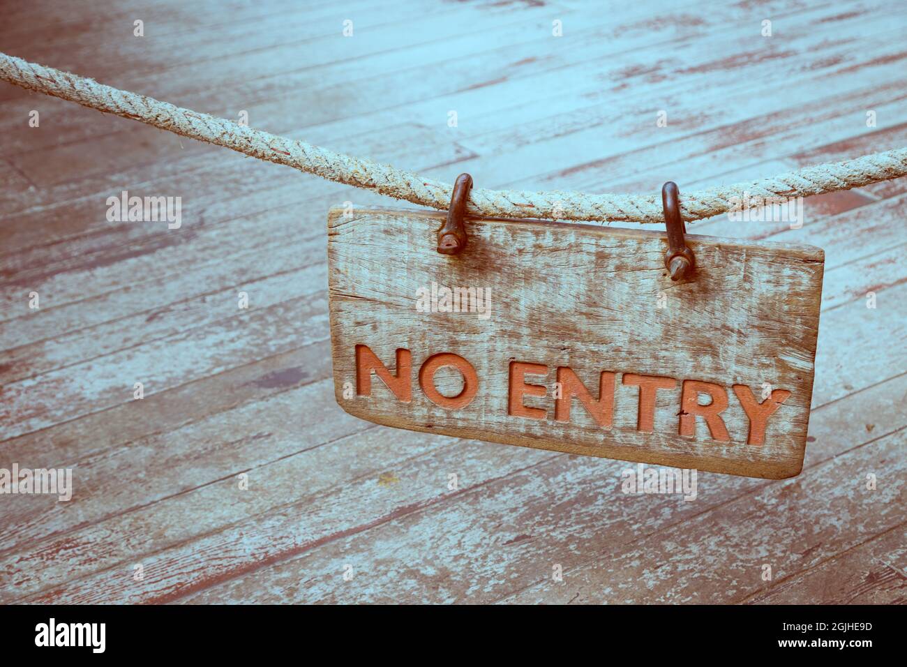 No Entry wood sign with old rope on old wood background Stock Photo - Alamy