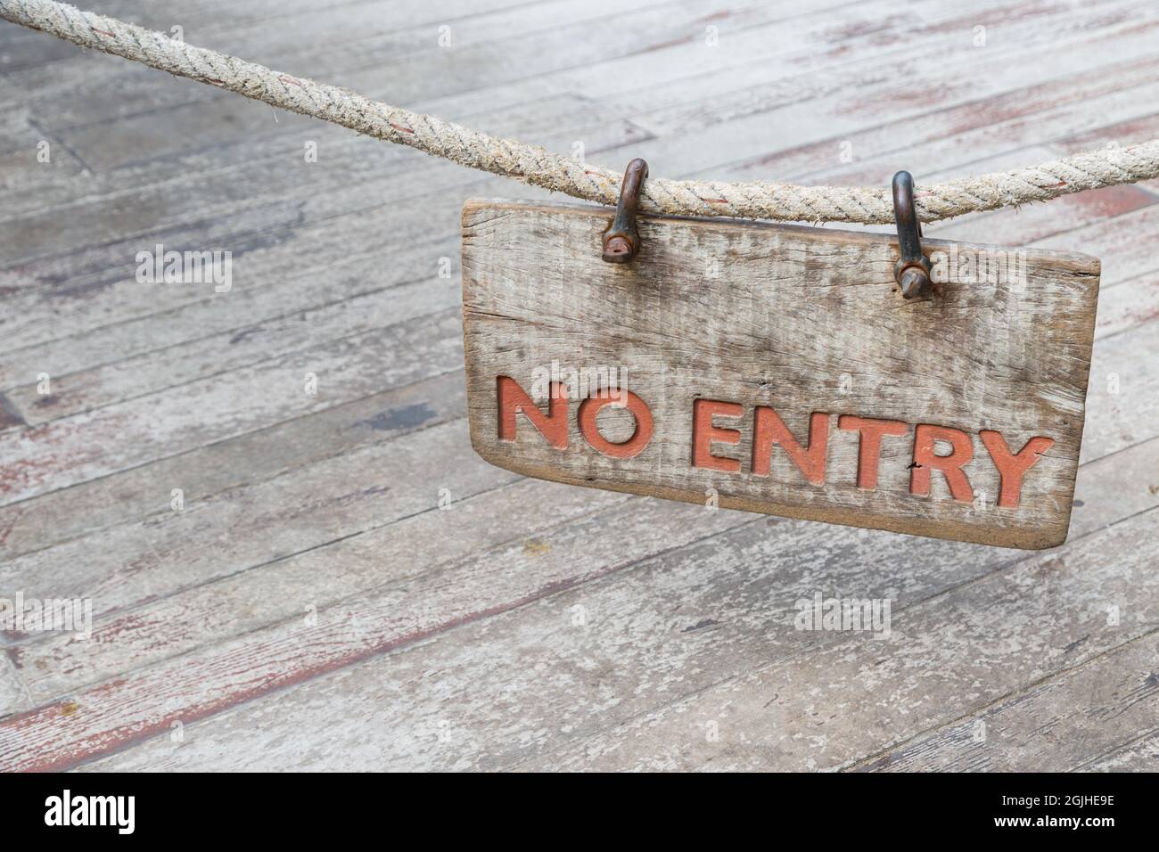 No Entry wood sign with old rope on old wood background Stock Photo - Alamy