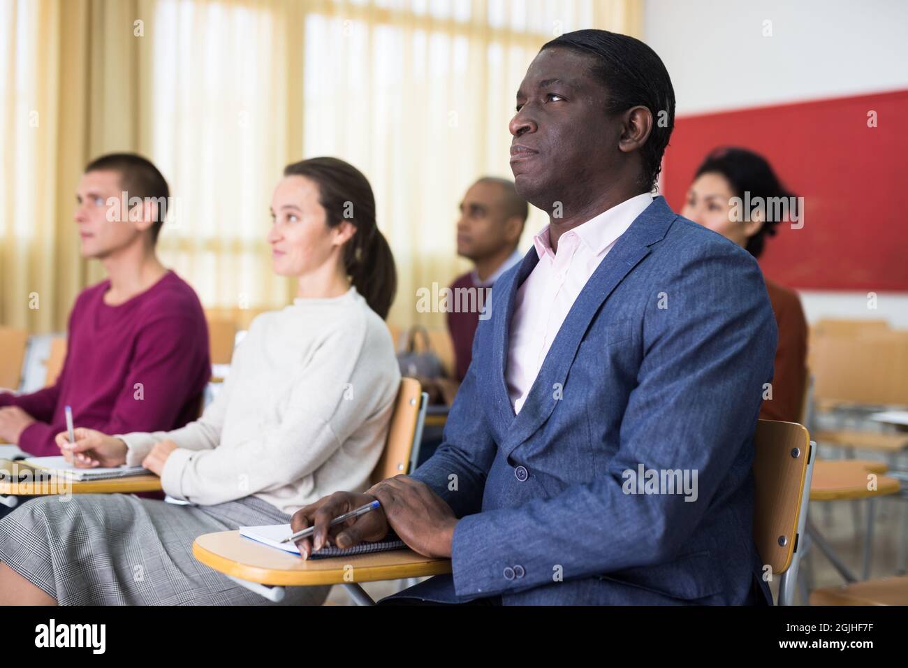 African-american student among students in classroom Stock Photo - Alamy
