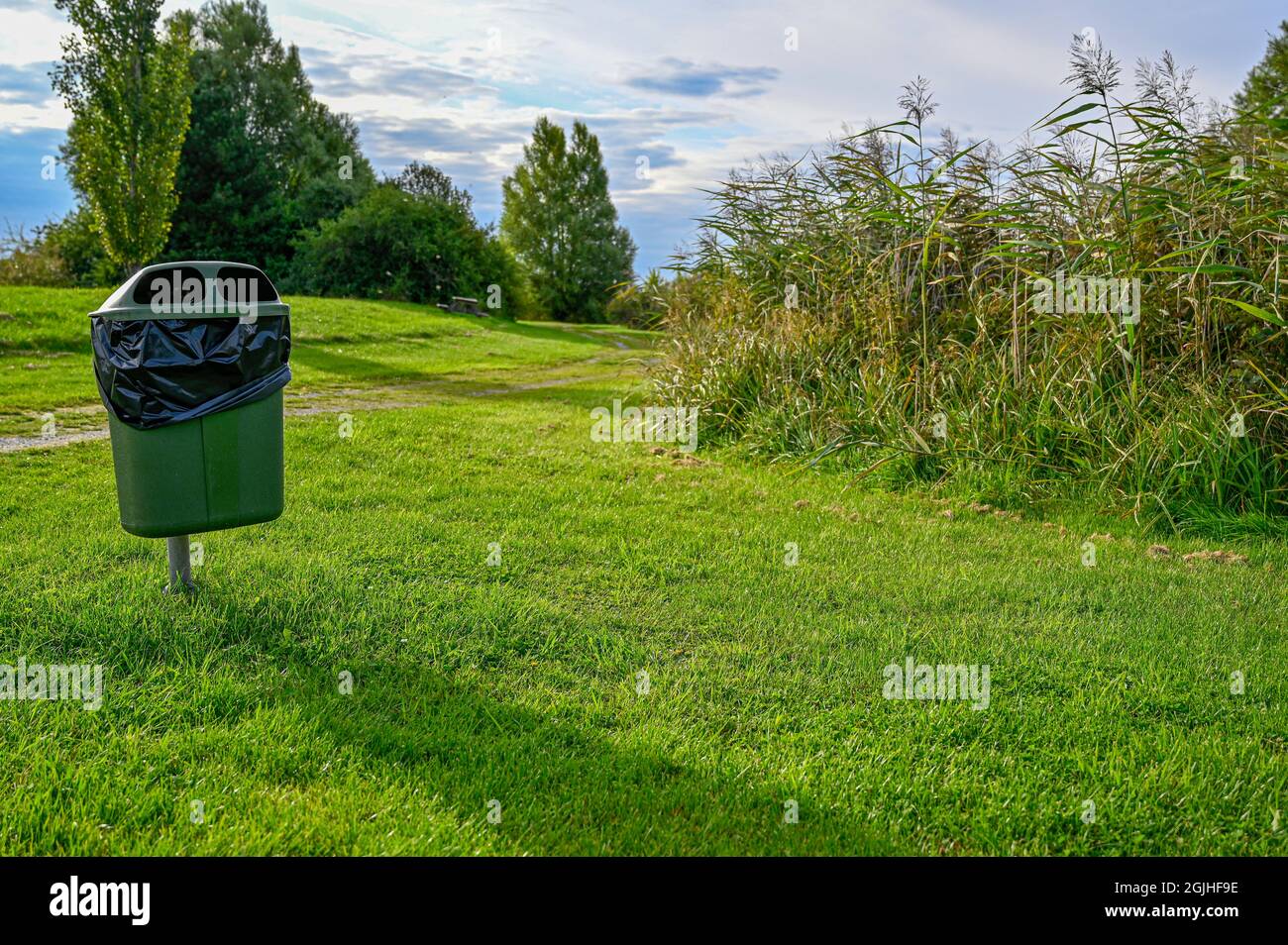 Plastic trash can in public park Kumla Sweden Stock Photo - Alamy