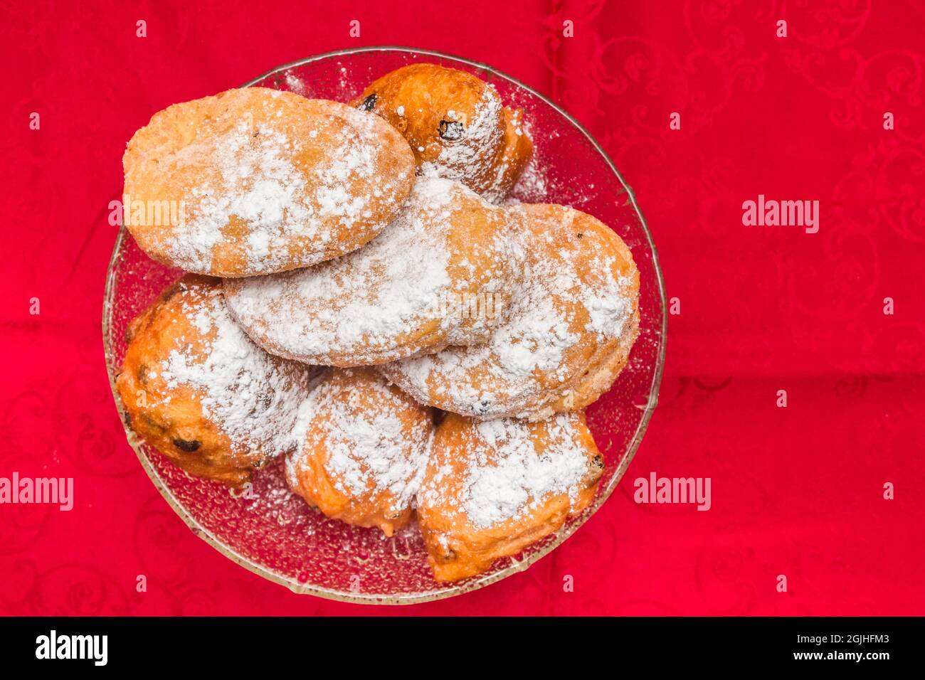 Top view of traditional dutch New Years Eve snacks: oliebol and ...