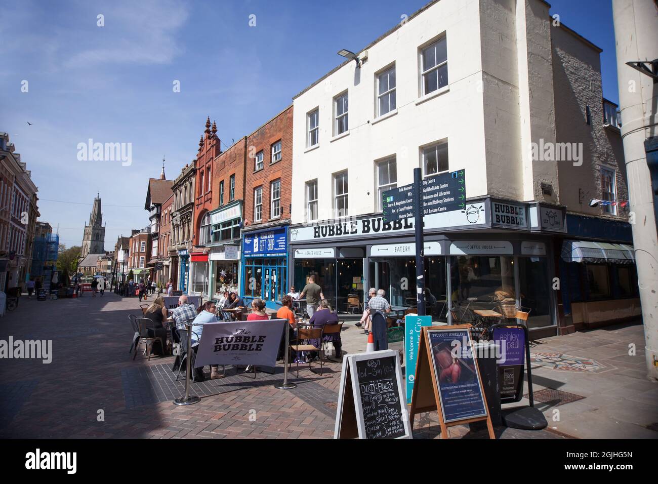 People eating outside in Gloucester Town Centre in the United Kingdom ...