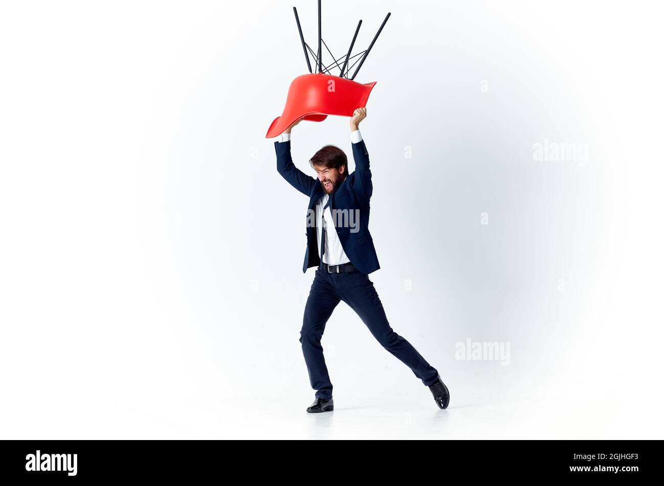 business man in suit red chair overhead office work Stock Photo - Alamy