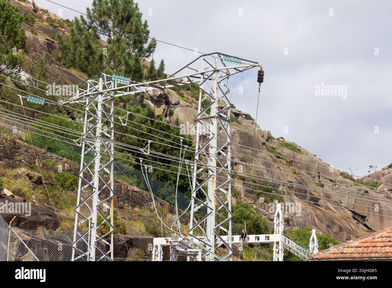 two small metal towers to transport the electrical energy Stock Photo ...