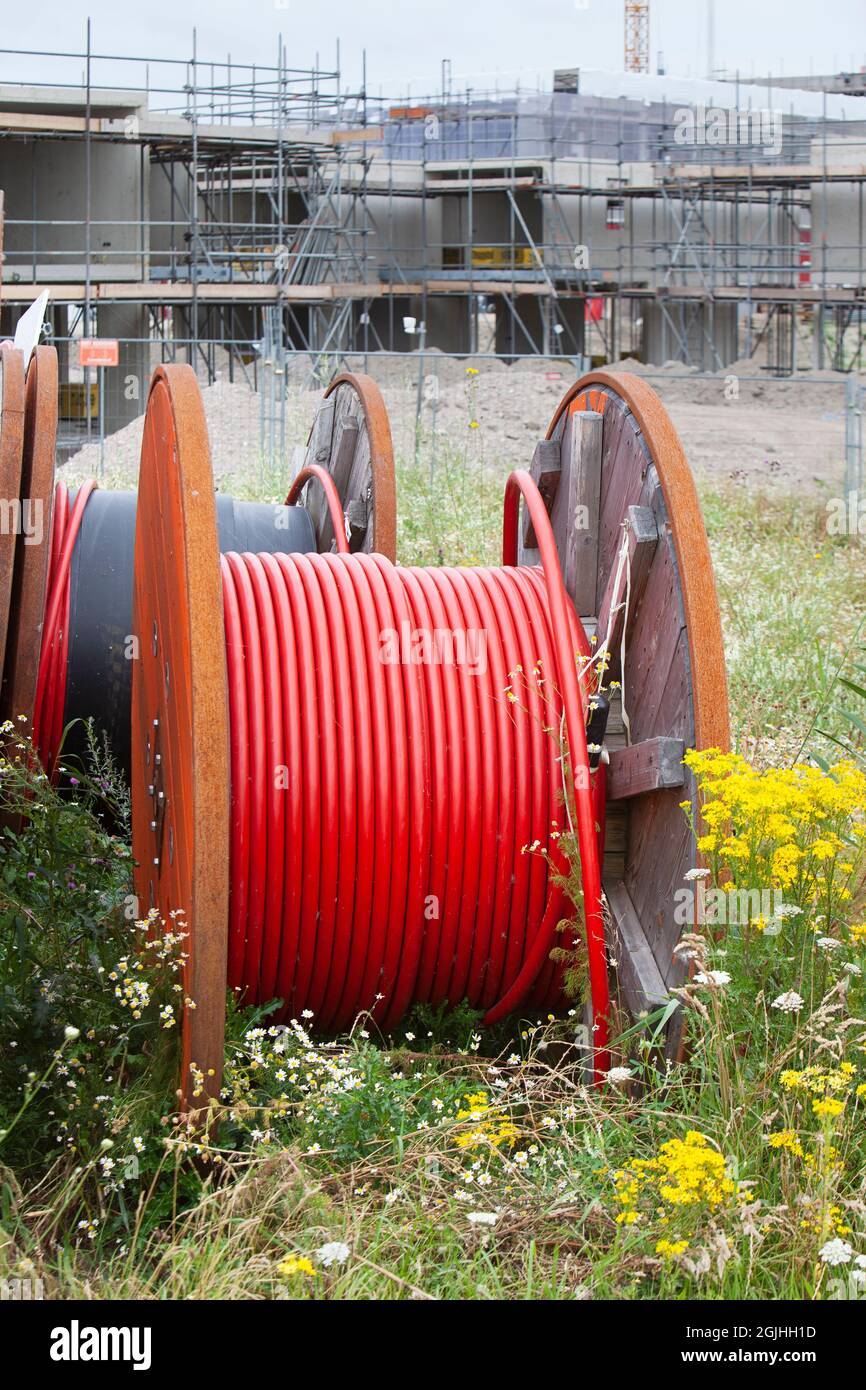 Huge spools with cables for the construction industry to connect new ...