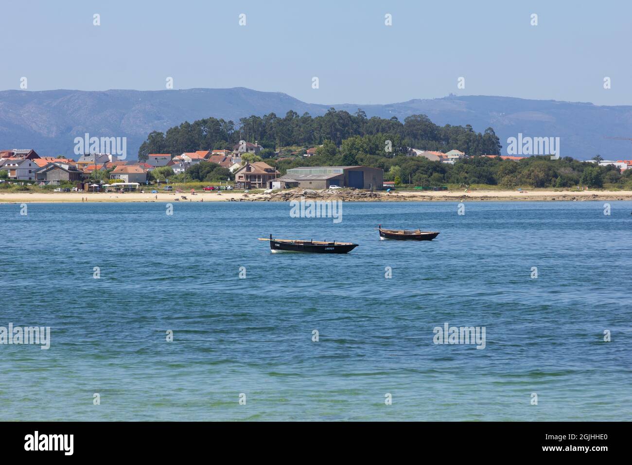 Classic wooden and antique fishing boats. Rowing boats without motor ...