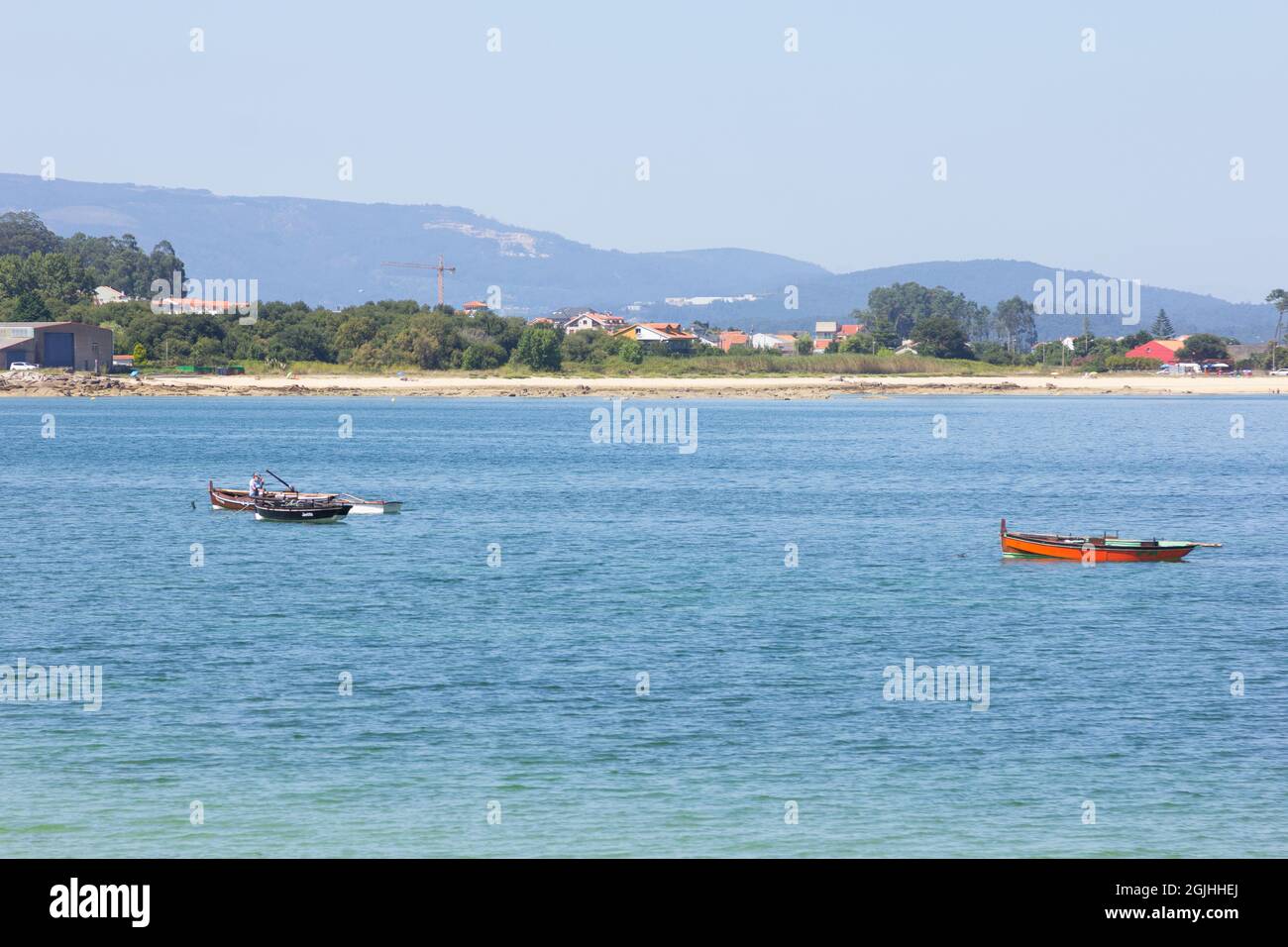Classic wooden and antique fishing boats. Rowing boats without motor ...