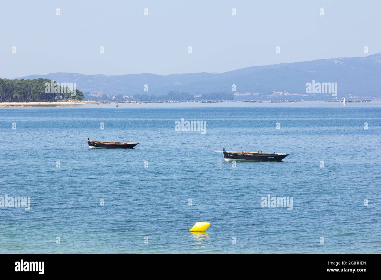 Classic wooden and antique fishing boats. Rowing boats without motor ...