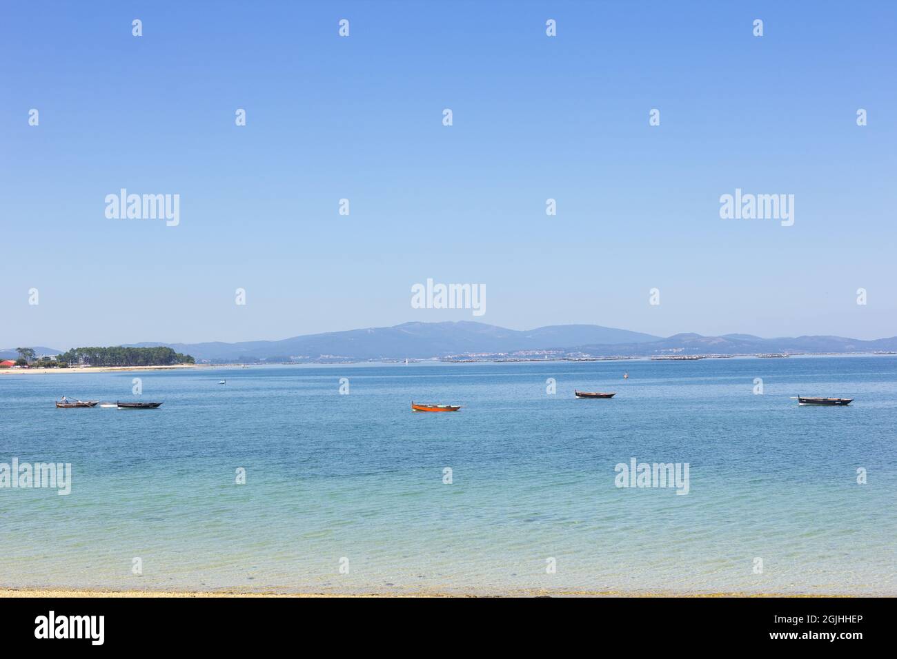 Classic wooden and antique fishing boats. Rowing boats without motor ...