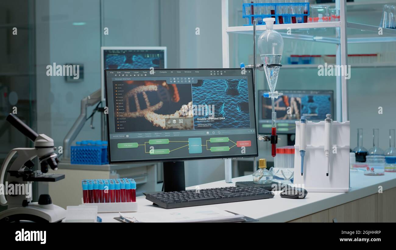 Close up of chemistry desk in laboratory workplace filled with research ...