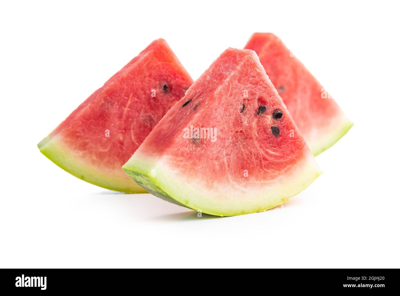 Red sliced watermelon. Pieces of red melon isolated on white background ...