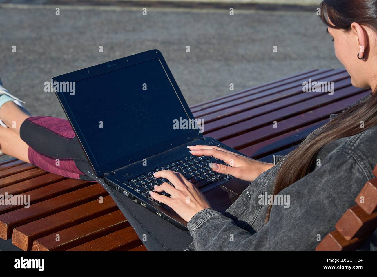 Female hands typing laptop keyboard close up Stock Photo - Alamy