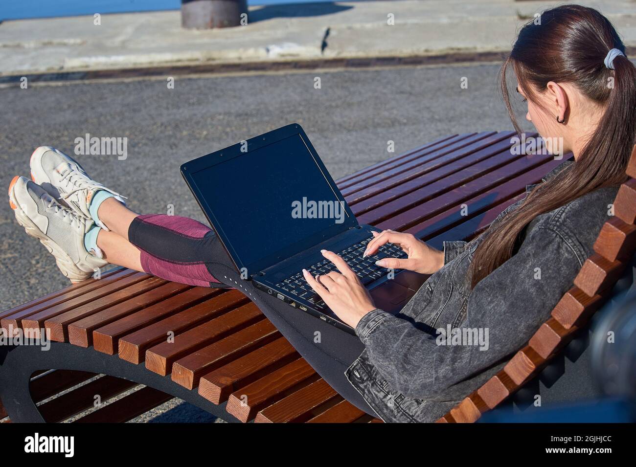 Female hands typing laptop keyboard close up Stock Photo - Alamy