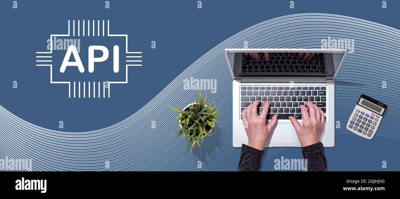 Top view of hands using laptop with symbol of api concept Stock Photo ...