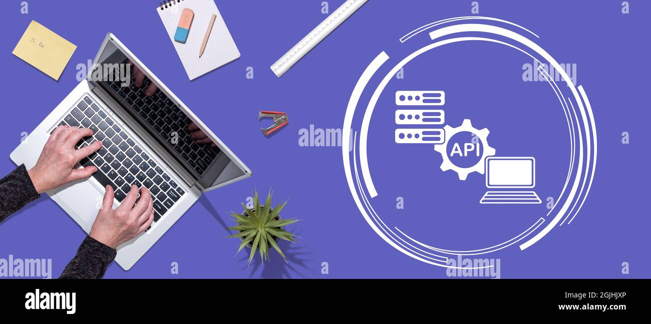 Top view of hands using laptop with symbol of api concept Stock Photo ...