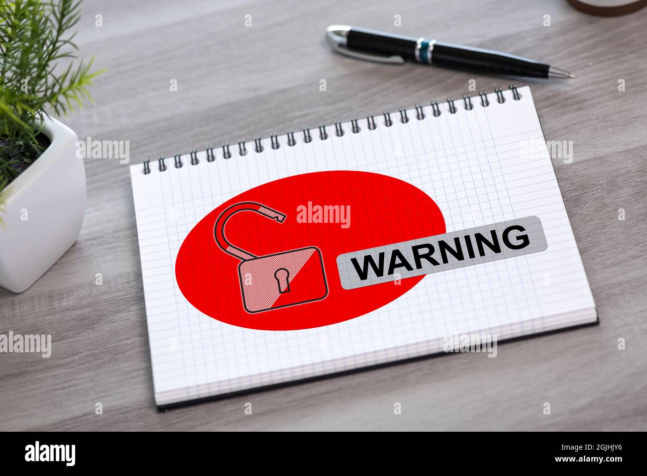 Warning concept drawn on a notepad Stock Photo - Alamy