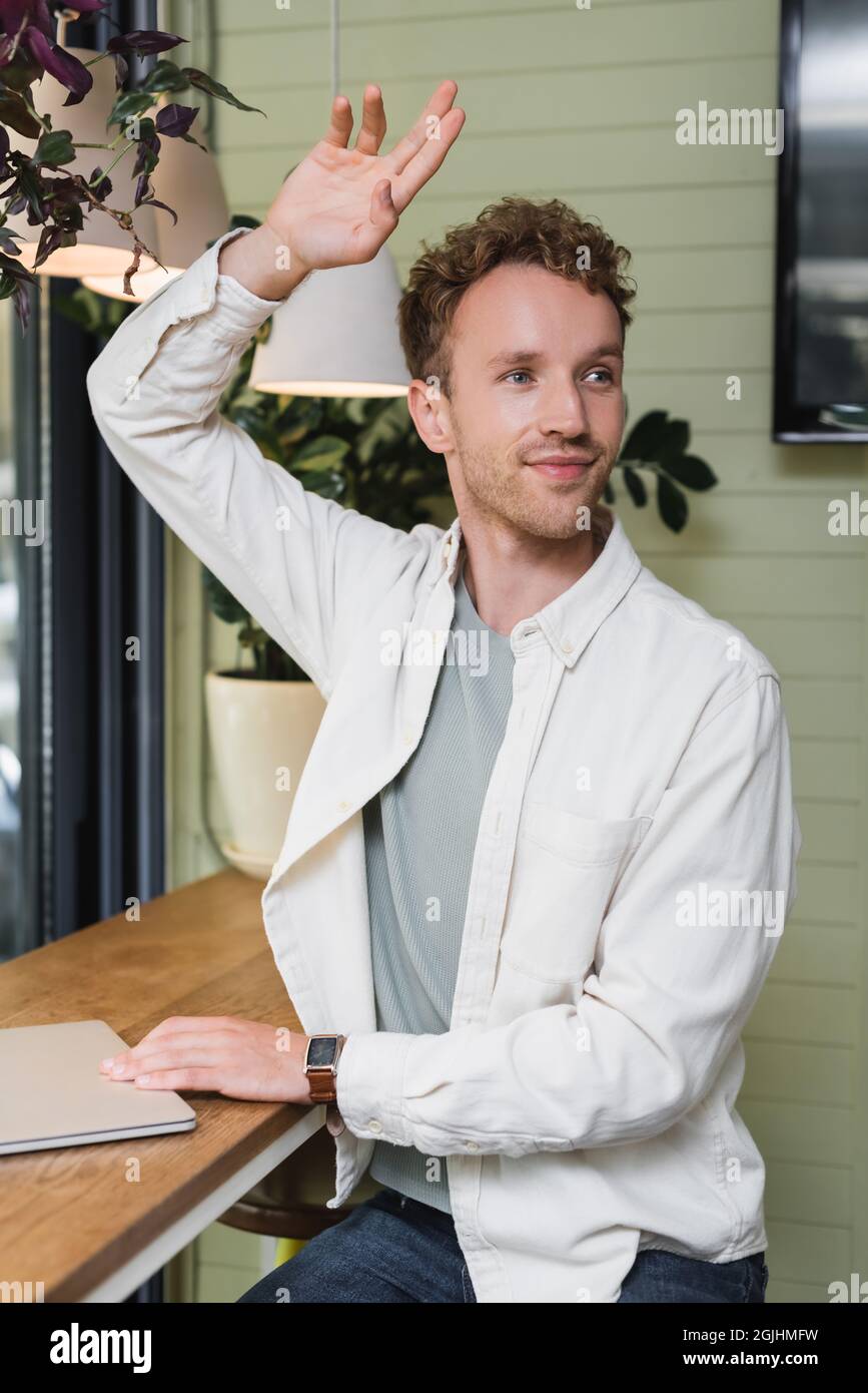 Hand gesture cafe waiter hi-res stock photography and images - Alamy