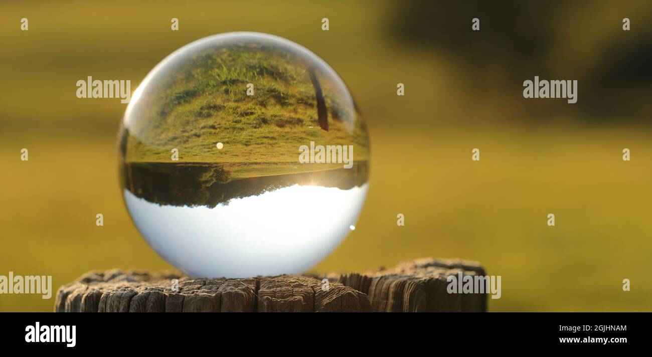 a beautiful landscape photographed through a lens ball Stock Photo - Alamy