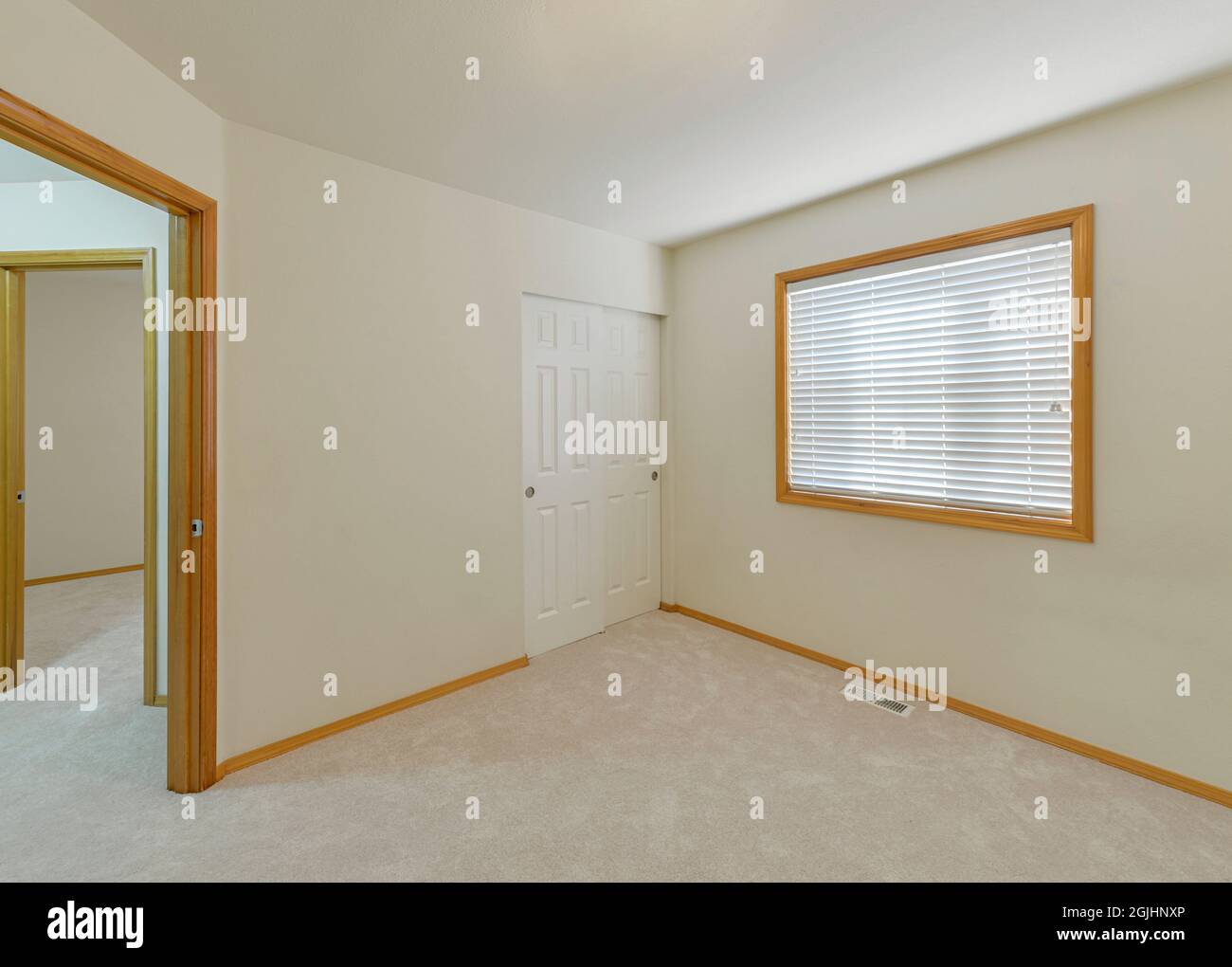 Modern residential empty bedroom interior Stock Photo - Alamy