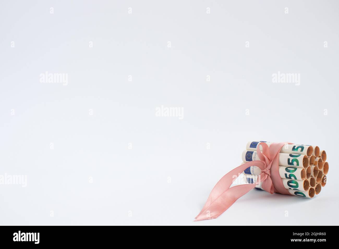 Money and pink ribbon hi-res stock photography and images - Alamy