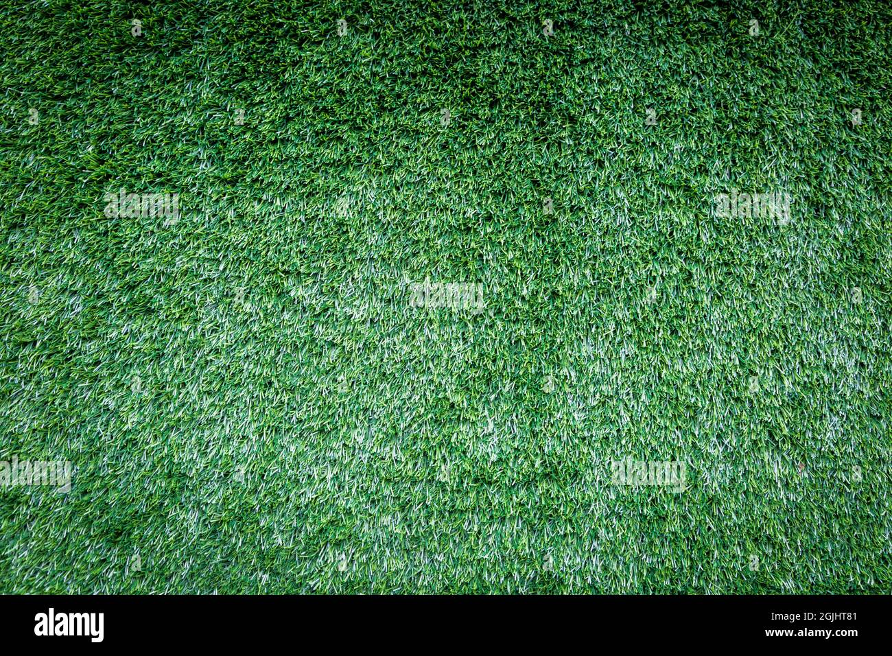 Green grass artificial turf pattern background Stock Photo - Alamy