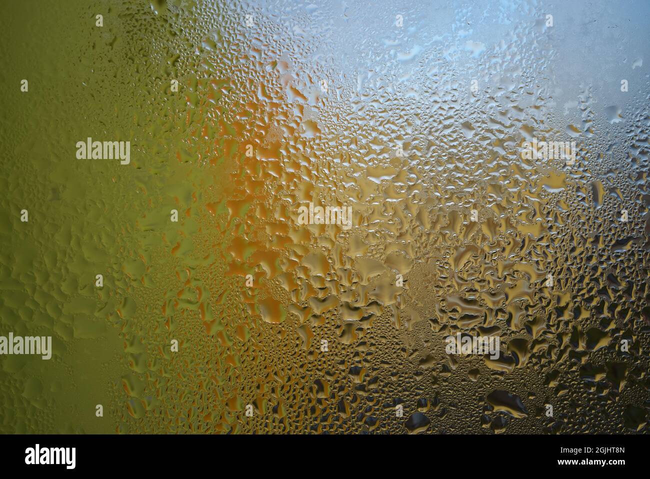 Condensation with beaded moisture droplets on the outside of a cold ...