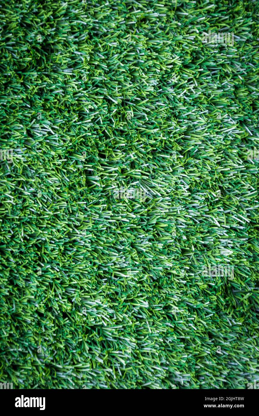 Green grass artificial turf pattern background Stock Photo - Alamy