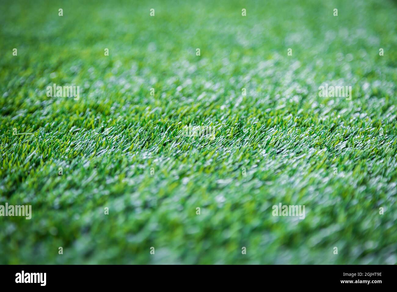 Green grass artificial turf pattern background Stock Photo - Alamy
