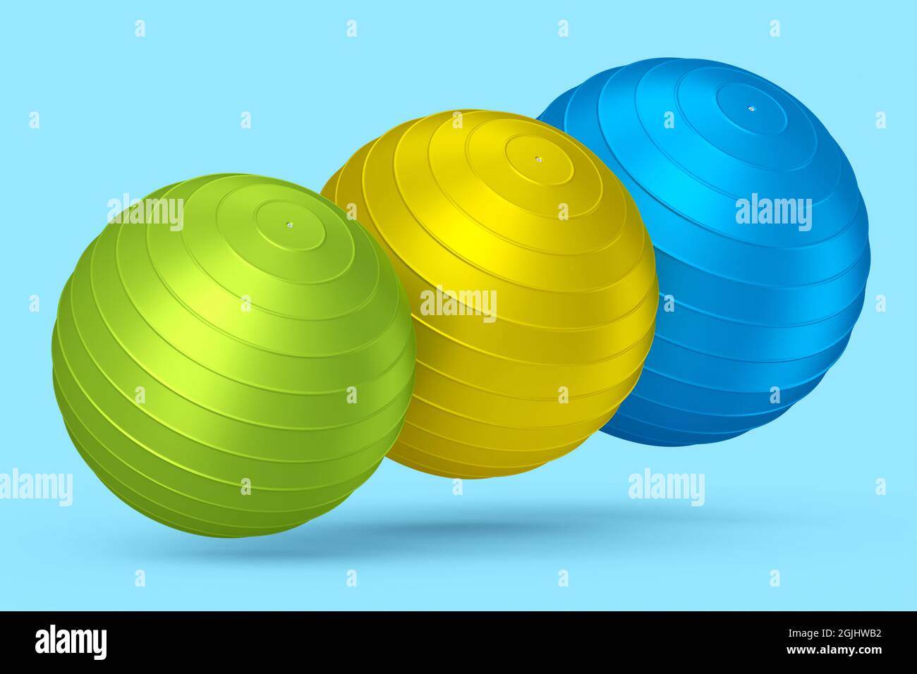 Multicolor fitball or fitness ball isolated blue background. 3d ...