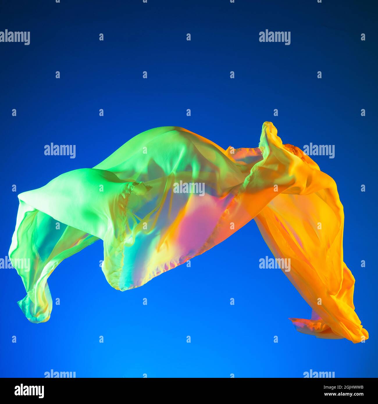 Elegant transparent multicolored flying piece of fabric isolated over ...