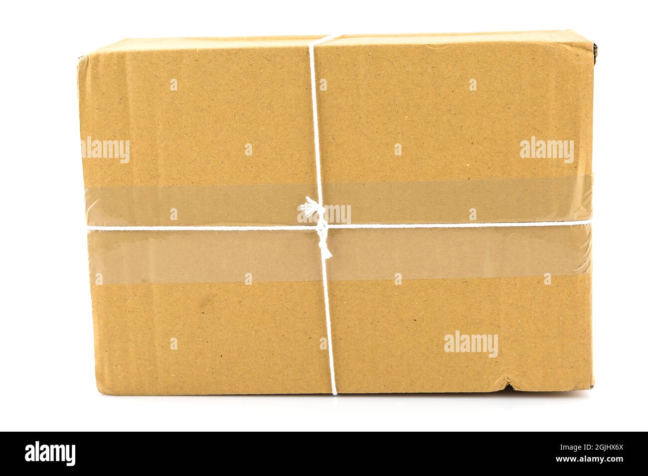 brown paper box tied with white string ready to send isolated on white ...